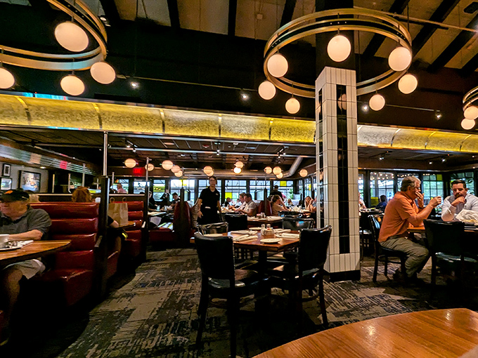 The dining room hums with conversation and clinking glasses—a symphony of satisfaction conducted by invisible hands and punctuated by occasional food moans.