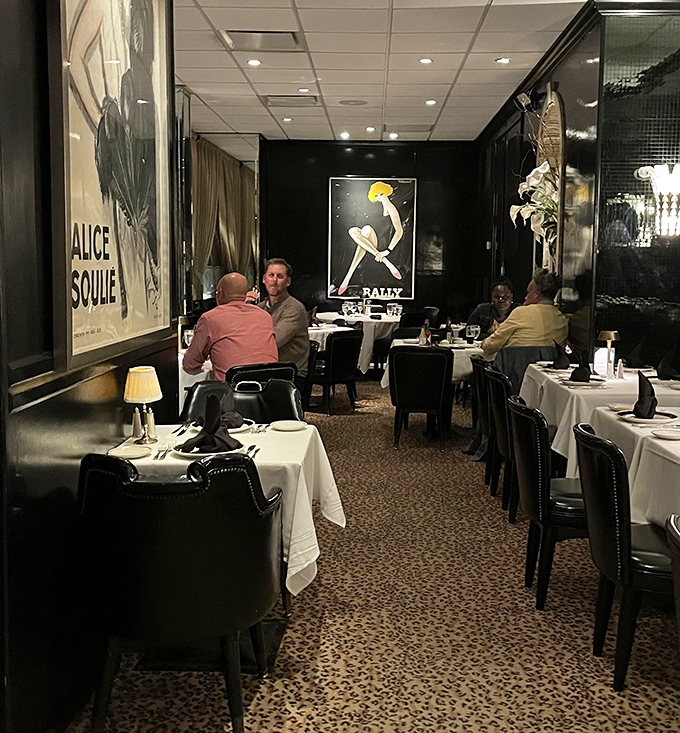 Art on the walls, art on the plates. The black and gold décor creates an atmosphere where even Tuesday dinner feels like a special occasion.