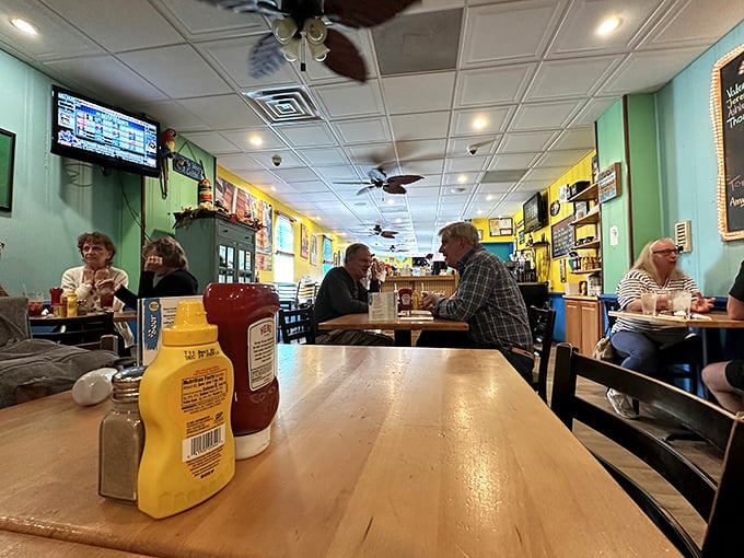 The dining room buzzes with the energy of people who know they've made an excellent decision for lunch. Condiments stand ready for their supporting roles.