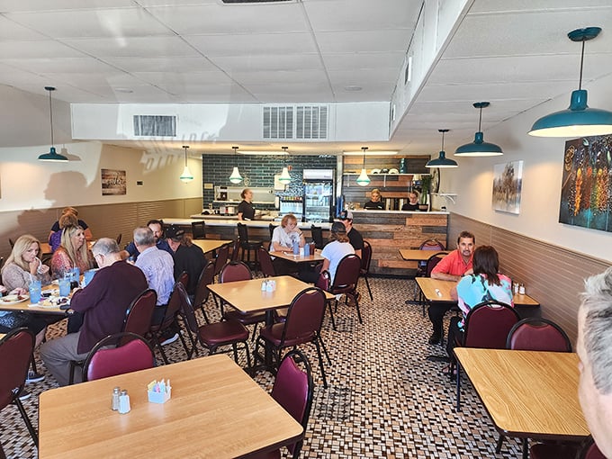 The dining room buzzes with conversation and clinking forks – a cross-section of Batavia life all drawn together by the promise of good food.