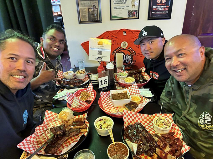 BBQ brings people together like nothing else. Four happy faces, four trays of meat, zero regrets.
