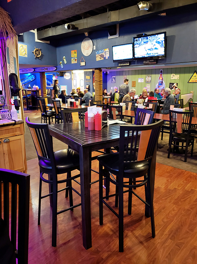 Where locals gather to break bread and swap stories – the lively dining room buzzes with the sound of satisfied customers and clinking glasses.