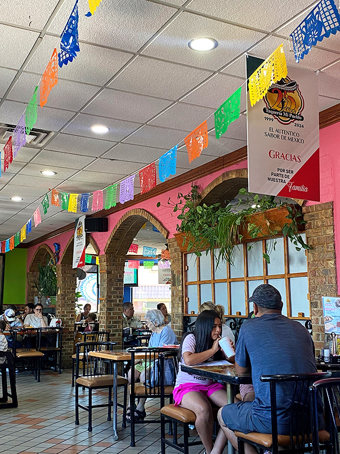 Families gather under strings of colorful flags, creating memories over meals. This isn't just dining out—it's a cultural communion that happens to involve excellent food.