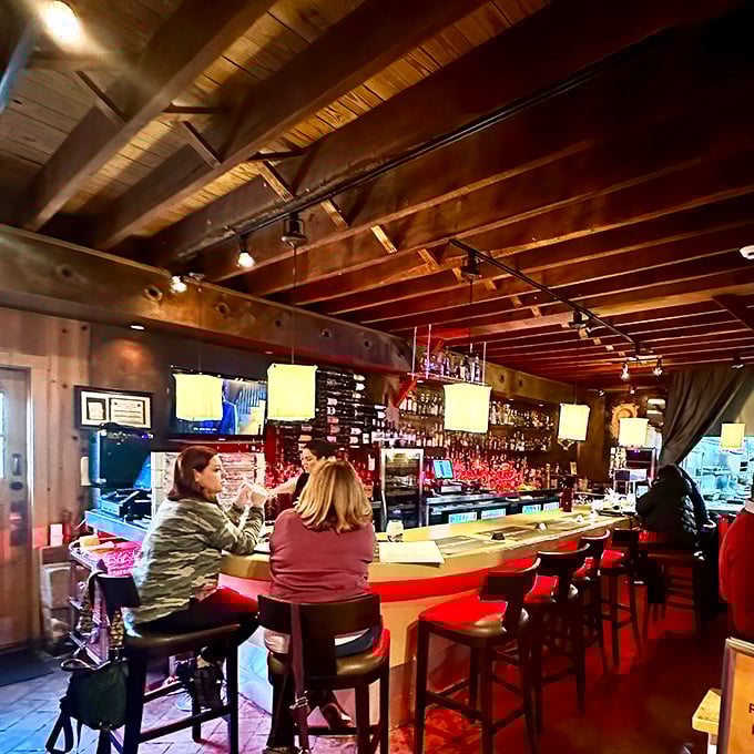 The bar's wooden beams and red accents create the perfect backdrop for that "I've discovered something special" moment with friends.