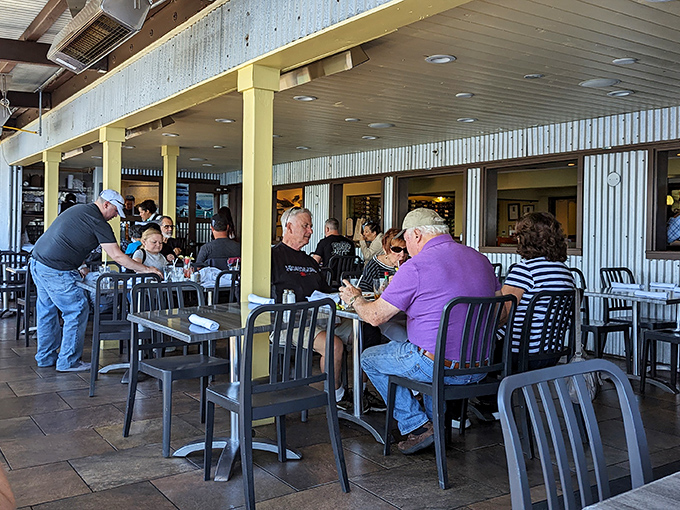 The outdoor patio—where strangers become friends over glasses of wine and shared appreciation for Monterey's perfect weather.
