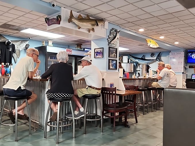 The counter seating isn't just functional—it's where regulars become family and first-timers become regulars. Notice nobody's looking at their phones?