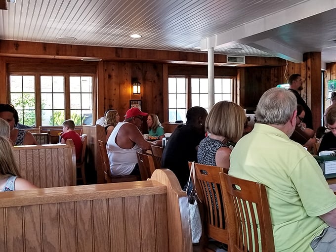 The dining room hums with the universal language of "mmm." Strangers united by the shared religion of good food.