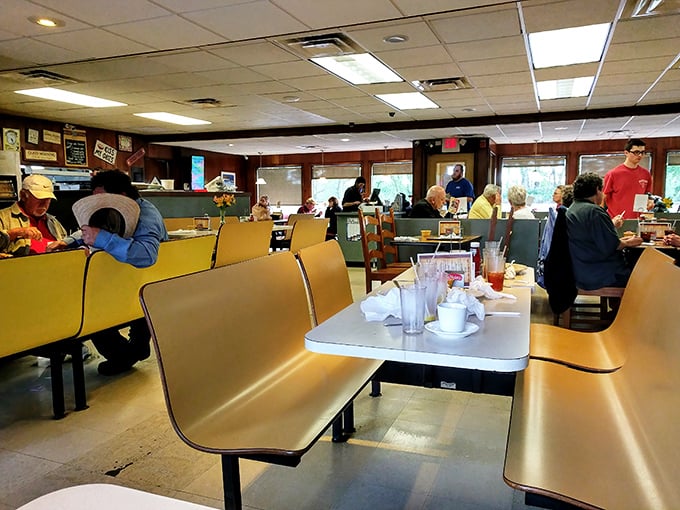 The bustling dining room hums with conversation and the clinking of silverware—the soundtrack of American diner culture at its finest.