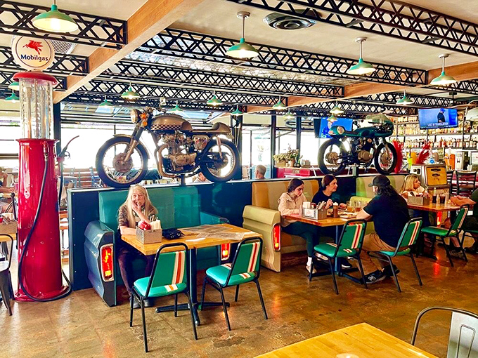 The vintage gas pump stands sentinel as diners dive into their meals. Some restaurants have ambiance—this place has personality.