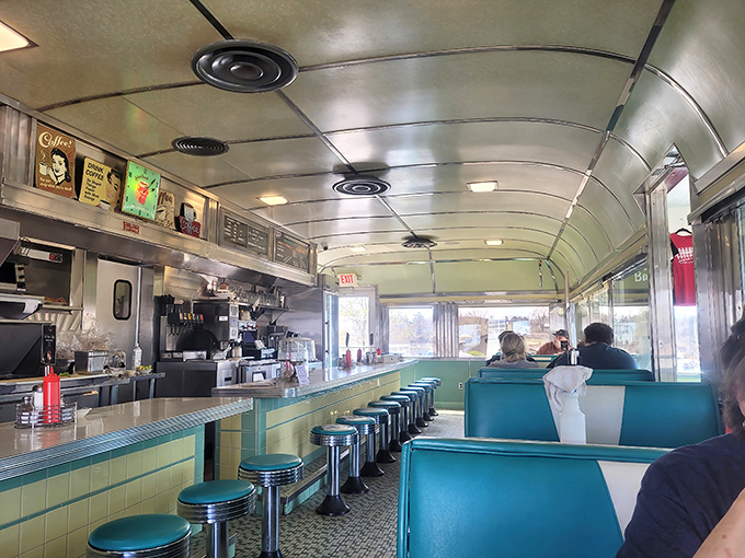 The curved ceiling and classic counter seating aren't designed to be nostalgic—they simply never stopped being perfect. Diner design at its timeless best.