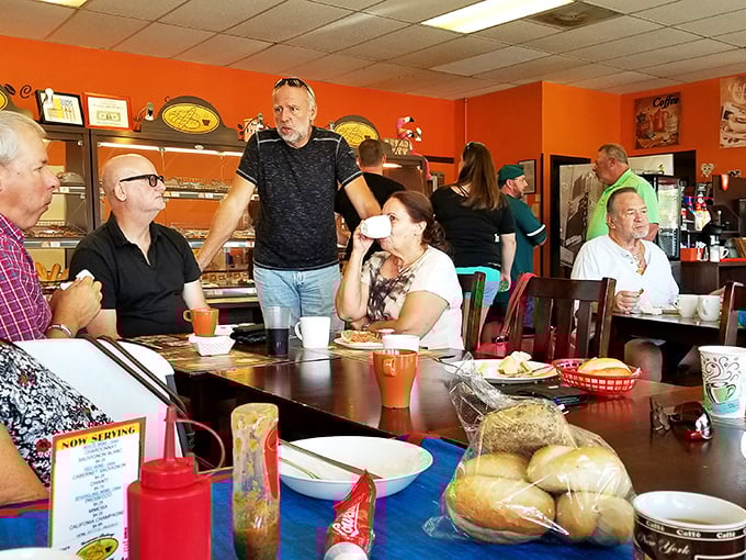 The bustling interior captures that magical community vibe where regulars become family and first-timers instantly feel like they've discovered a secret club.