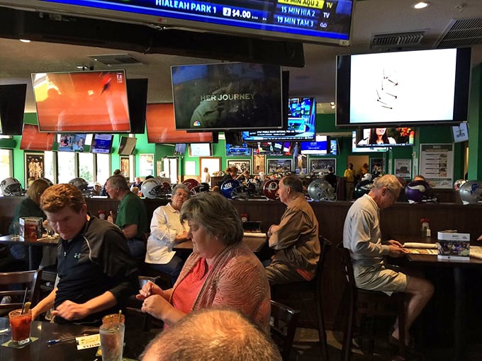 The dining room hums with the electric energy of locals and travelers breaking bread together – democracy in its purest form.