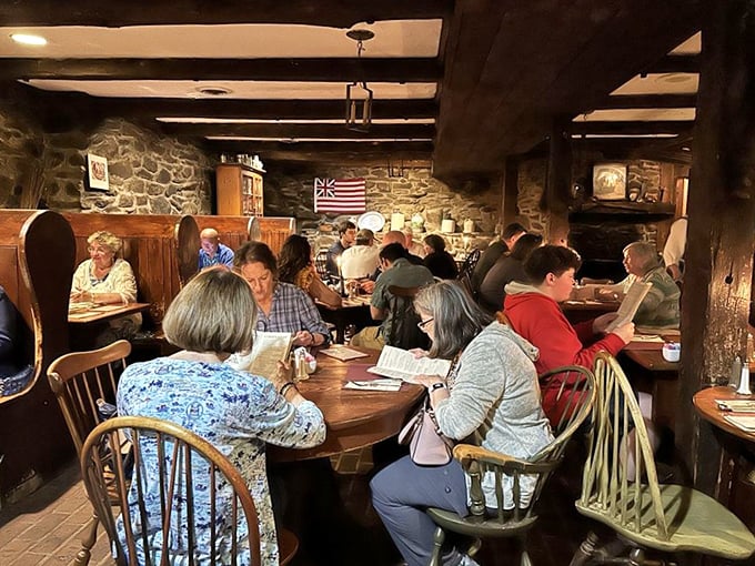 The tavern hums with the satisfied murmurs of diners experiencing what might be the most authentic colonial meal this side of a time machine.