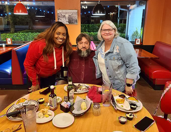 Great steakhouses create more than meals—they create memories. These happy diners aren't just eating dinner; they're collecting stories to tell later.