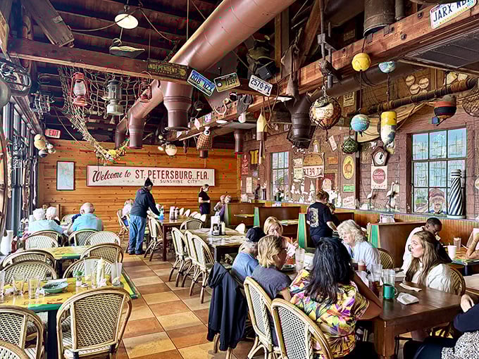 The dining room buzzes with the happy sounds of people who've discovered real Florida seafood. Notice the absence of phones—the food demands full attention.