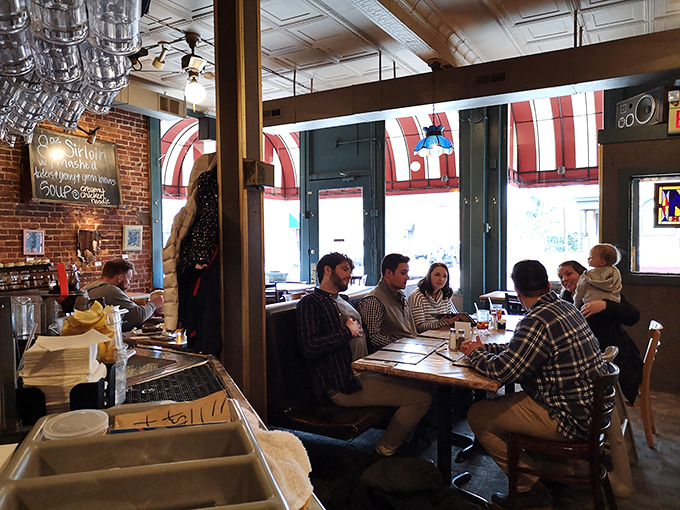Where families and friends gather to share not just meals, but moments. Notice nobody's looking at their phones—the food demands full attention.