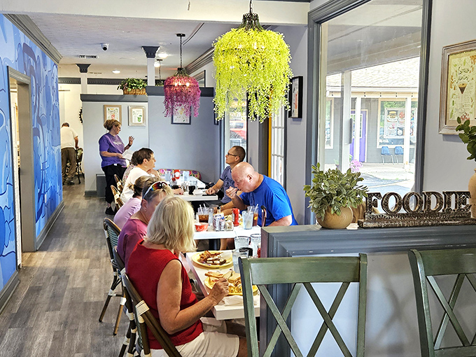 Happy diners enjoying their breakfast bounty in an atmosphere that feels like visiting family.