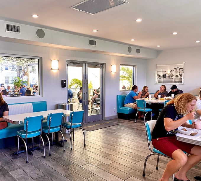 The dining room feels like someone's idealized memory of the perfect burger joint—bright, clean, and ready for your food fantasies.