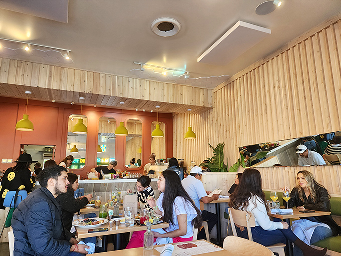 Where morning people and "don't-talk-to-me-until-coffee" people find common ground. The colorful beverages are social currency here.