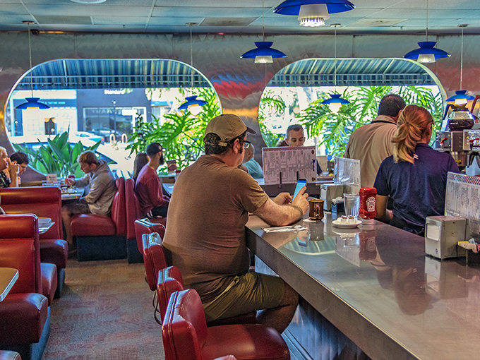 Counter culture at its finest—where regulars and first-timers alike find communion in coffee and conversation. Notice how nobody's looking at their phones?