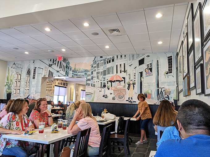Where food brings people together. This mural-backed dining area has witnessed countless celebrations, conversations, and the silent nods of sandwich appreciation.