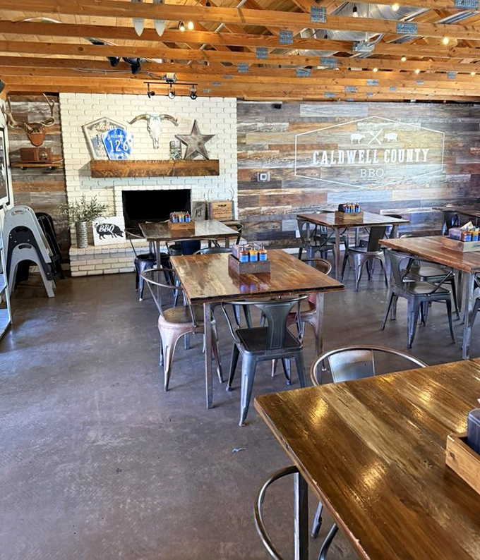 Industrial-chic meets Texas warmth in this dining room where the wooden tables are stages for meat-centric performances.