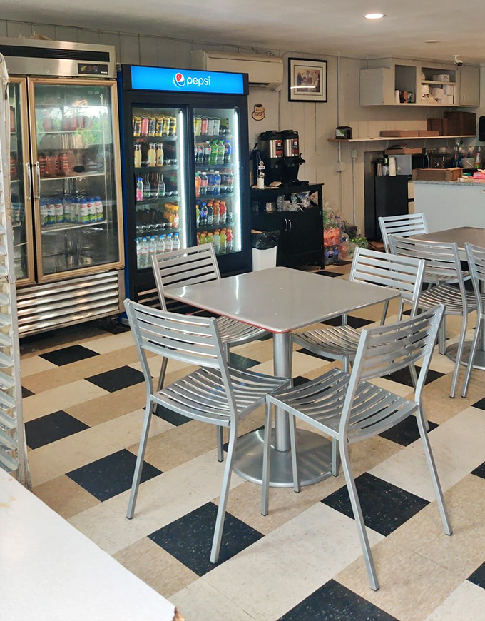 The dining area might not win design awards, but it's got something better—the aroma of fresh donuts and the satisfied sighs of people living their best lives.