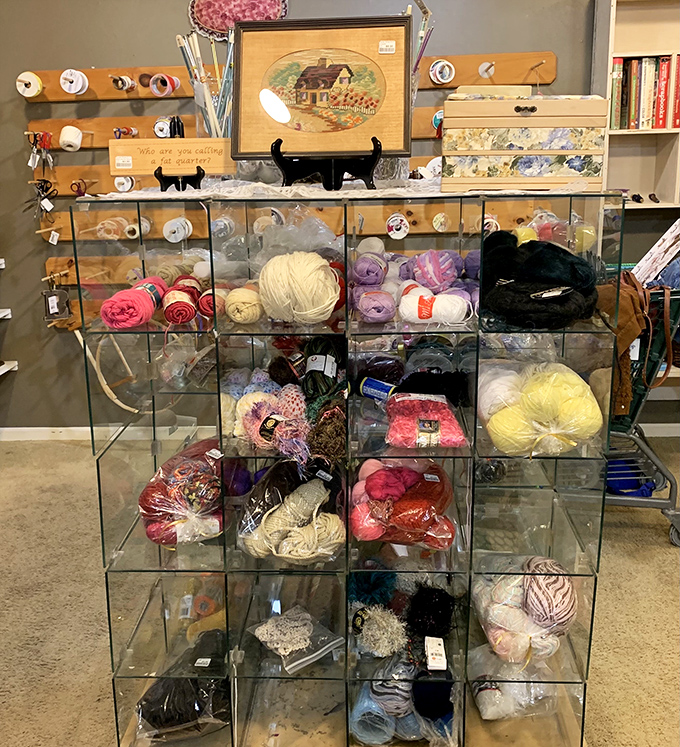A crafter's dream – cubbies of yarn in every shade imaginable, waiting to become someone's next handmade masterpiece or unfinished project.