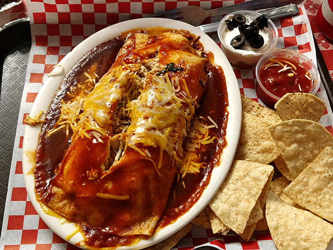 Enchiladas swimming in a lake of vibrant sauce and melted cheese. This plate doesn't just feed you—it hugs your soul from the inside.