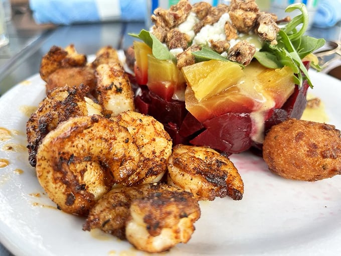 Blackened shrimp and colorful heirloom tomatoes—proof that salads don't have to be punishment for yesterday's dessert choices.