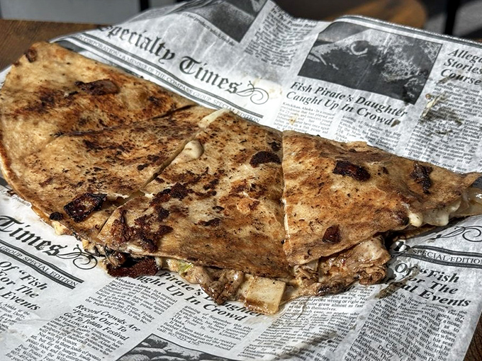 The filet mignon quesadilla represents fusion cuisine at its finest, marrying Mexican tradition with American premium beef.