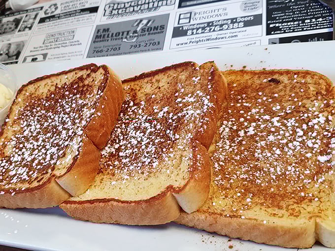French toast dusted with powdered sugar like a light Pennsylvania snowfall – simple breakfast perfection that makes you wonder why anyone needs avocado toast.