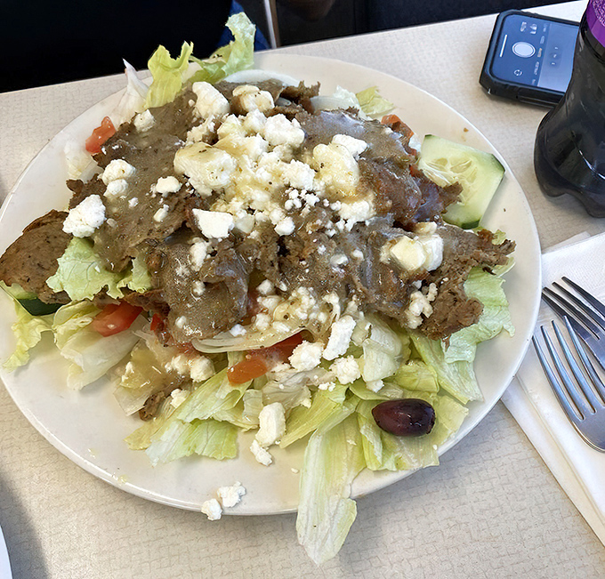 This Greek salad isn't just healthy – it's a Mediterranean vacation for your taste buds, with feta crumbles playing the role of beachside sunshine.