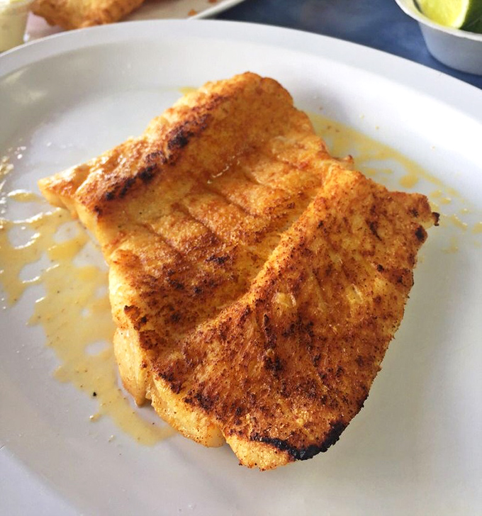 Perfectly grilled snapper that needs no introduction. Simple seasoning lets the fish be the star in this plate-sized masterpiece.