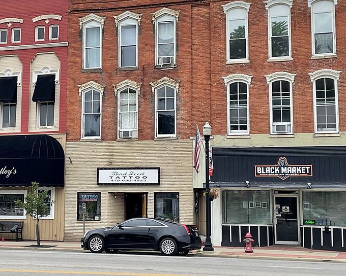 Even tattoo parlors and modern businesses find their place in Bryan's historic buildings—adaptation without sacrificing character.