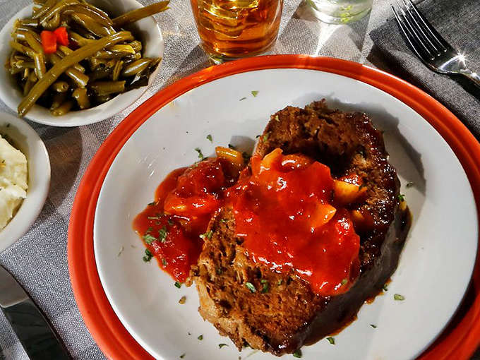 Homestyle meatloaf crowned with tangy sauce—the kind of dish that makes you want to call your mother and apologize for ever complaining about her cooking.