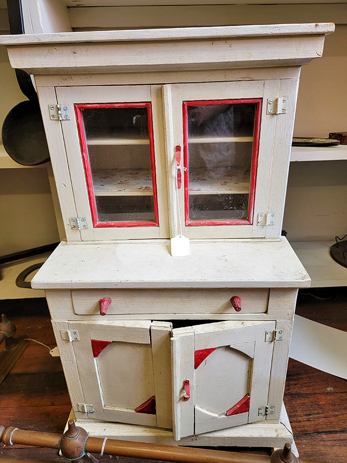 This isn't just kitchen furniture—it's a white Hoosier cabinet that witnessed countless family recipes before becoming Instagram-worthy vintage decor.