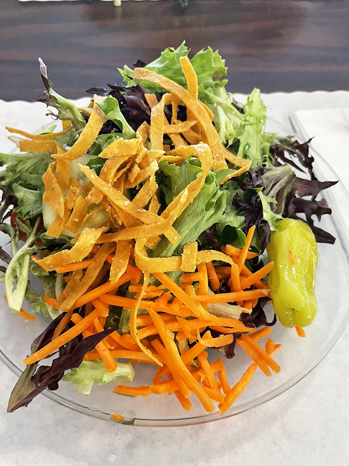 A salad that doesn't apologize for being healthy – those crispy tortilla strips add just enough rebellion to keep things interesting.