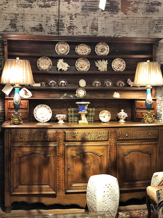 China displayed like family heirlooms you wish you had. This hutch isn't just furniture—it's a gallery wall for the dining room that Instagram was made for.