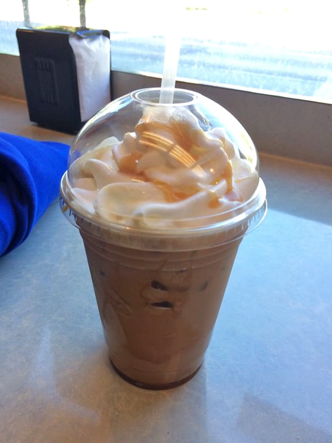 When coffee needs a makeover, it becomes this caramel-drizzled, whipped cream-topped masterpiece—dessert masquerading as a morning beverage.