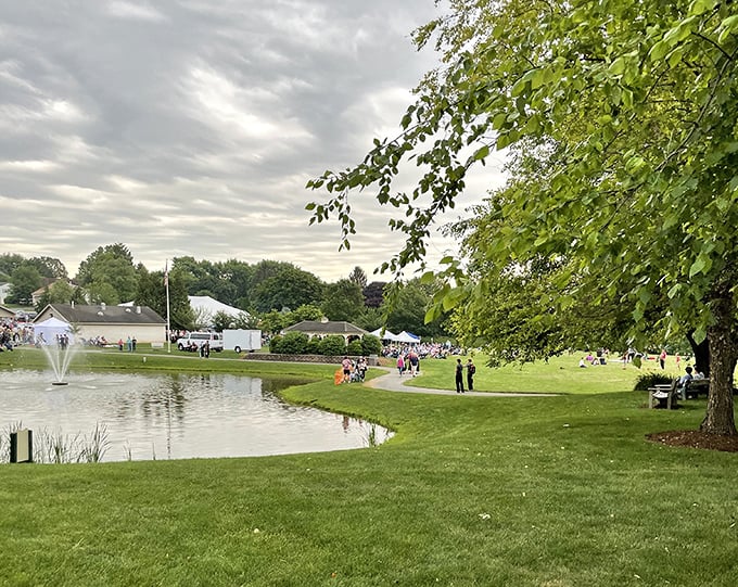 Community parks serve the same purpose everywhere – bringing people together in shared spaces where the pace slows and conversations flow.