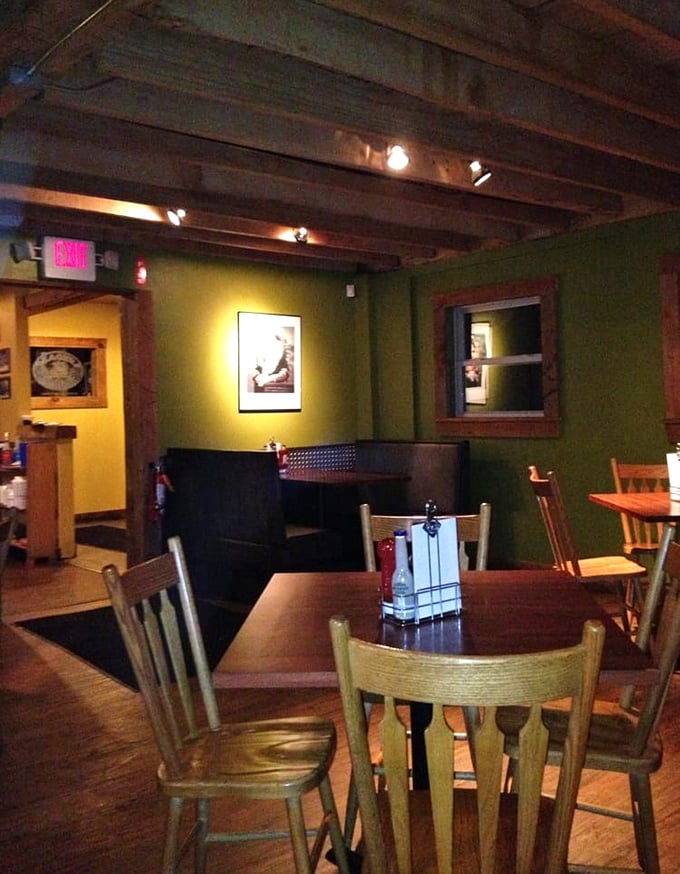 The dining room's olive walls and wooden beams create an atmosphere where strangers become friends over shared barbecue enthusiasm.