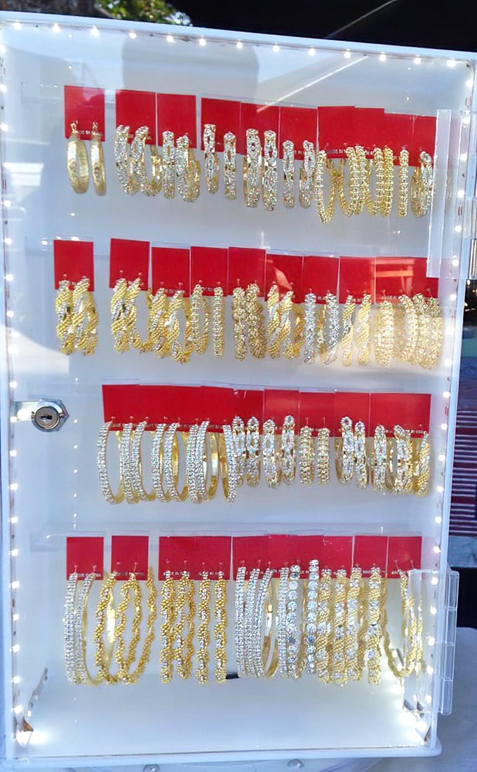 Gold and silver treasures glitter under display lights. These bangles and bracelets might be your next heirloom or just Tuesday's perfect accessory.