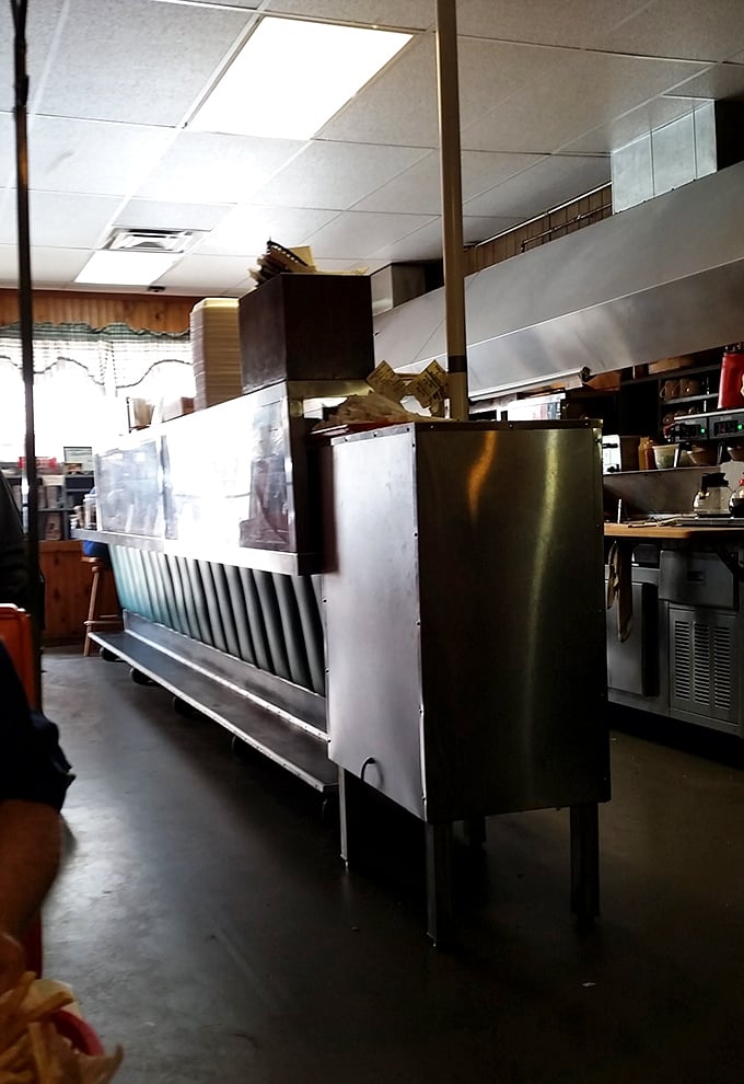 Behind the scenes where the magic happens—no molecular gastronomy or tweezers for plating, just decades of know-how and well-seasoned equipment.