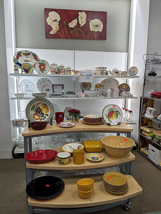 Dish paradise! From fruit-adorned plates to vintage Pyrex, this display proves your grandmother was right about keeping the good china.