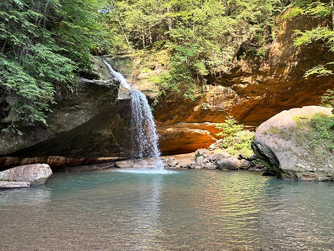 Lower Falls doesn't need height to impress—it's all about that perfect plunge into a crystal pool that's begging for a toe-dip on hot days.