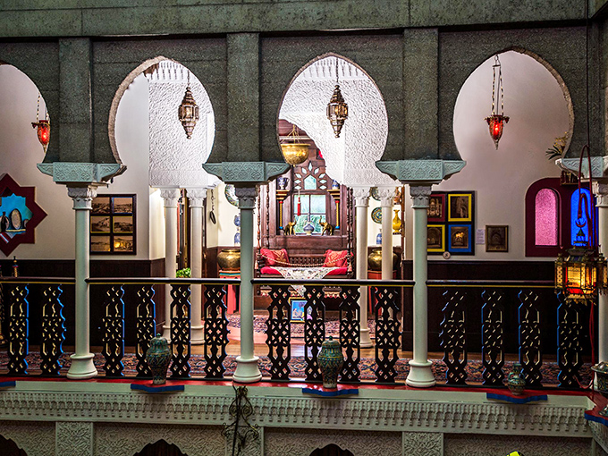 Moorish arches frame glimpses into adjacent rooms, creating a visual treasure hunt that keeps your neck on a constant swivel.