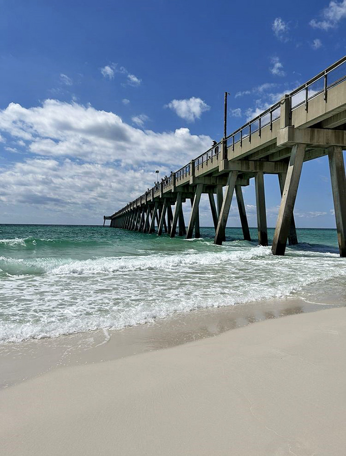 Engineering meets escapism: The Navarre Beach Fishing Pier stretches toward the horizon like a runway for dreams and fish tales.