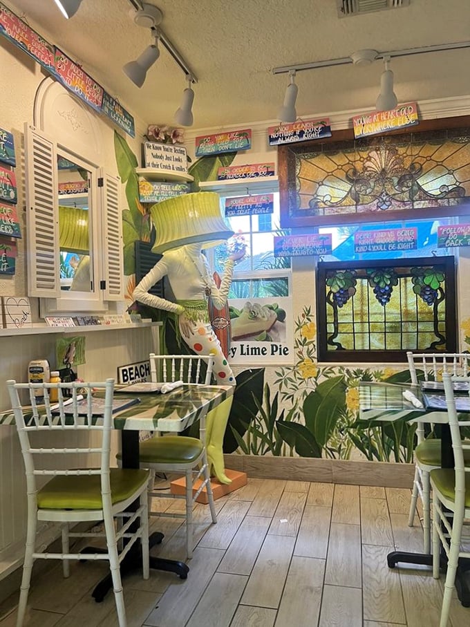 Tropical murals, stained glass, and whimsical decor—dining here is like eating inside a Jimmy Buffett song come to life.