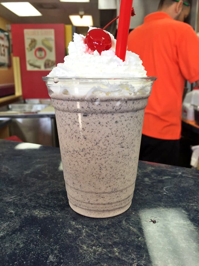 This cookies-and-cream masterpiece isn't just a milkshake—it's dessert with a straw, topped with enough whipped cream to make a cloud jealous.